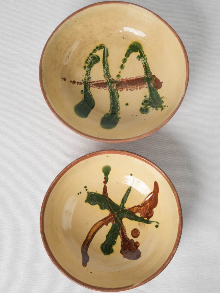 Set of 2 French yellow-ochre fruit bowls w/ green & red splatter patte