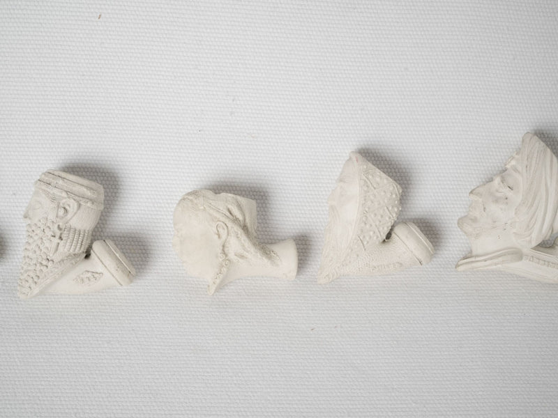 Collection of 10 antique French white clay smoking pipe avatars covers ...