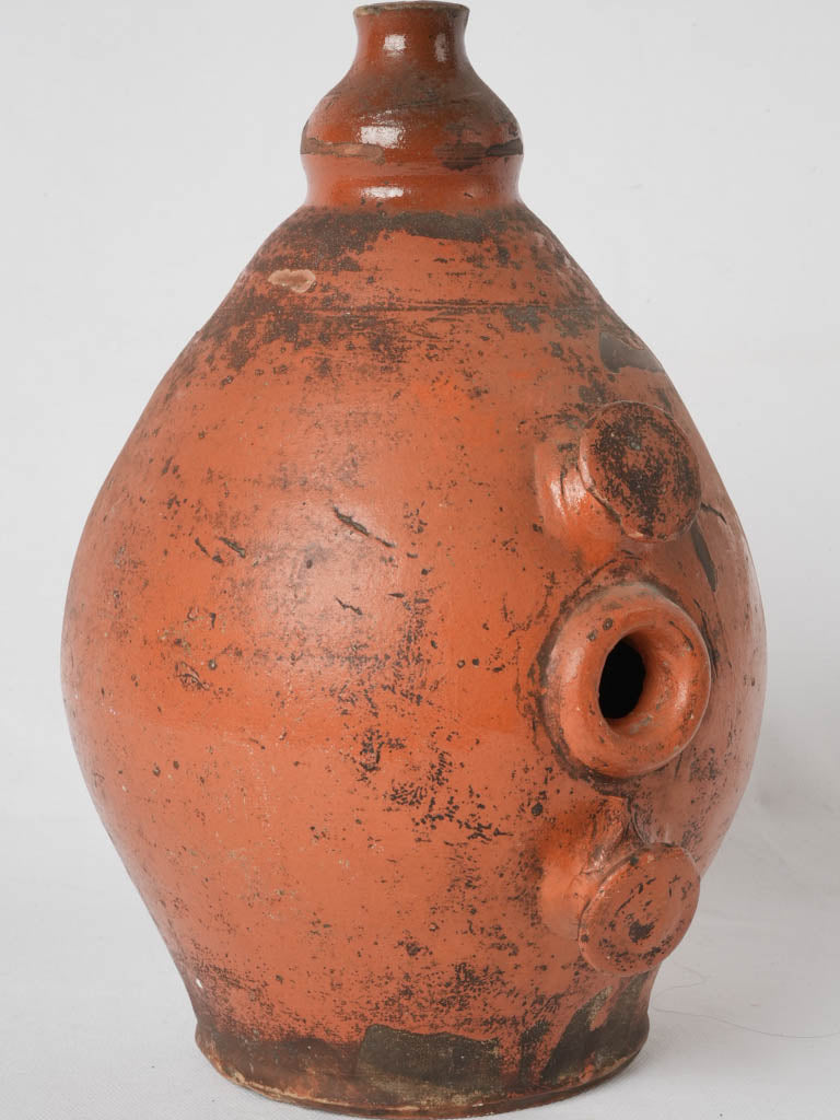 Rare 19th-century red-ochre glazed terracotta farm animal feeding jug ...