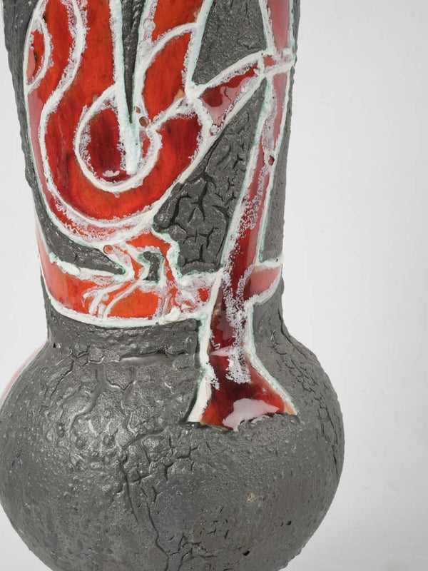 Large French volcanic black ceramic pitcher w/ red-glazed woodpecker d