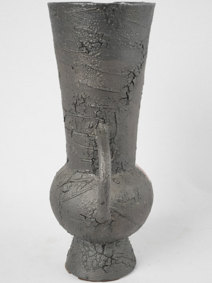 Large French volcanic black ceramic pitcher w/ red-glazed woodpecker d