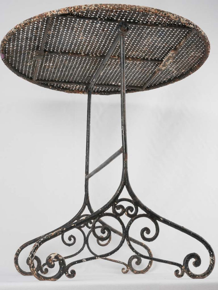 Antique French garden table with pierced clover-shaped design