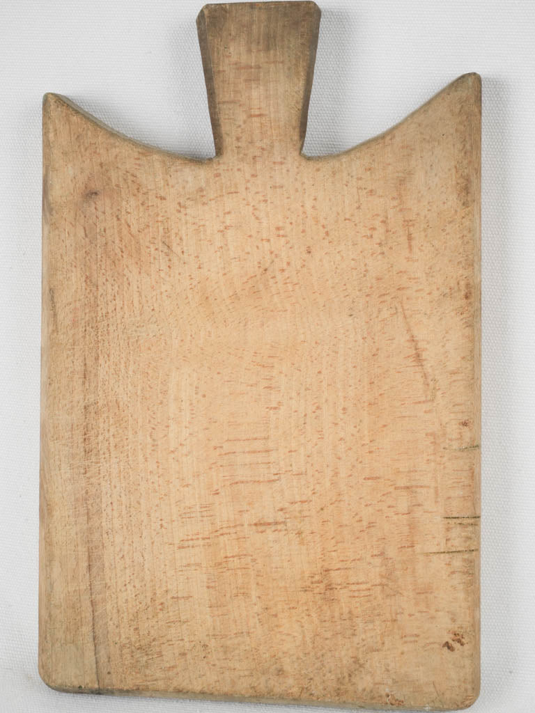 Small beechwood cutting board w/ curved shoulders flared handle 13¾" x