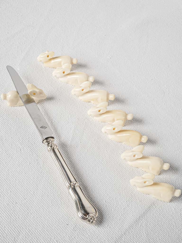 Set of 8 vintage white rabbit knife rests