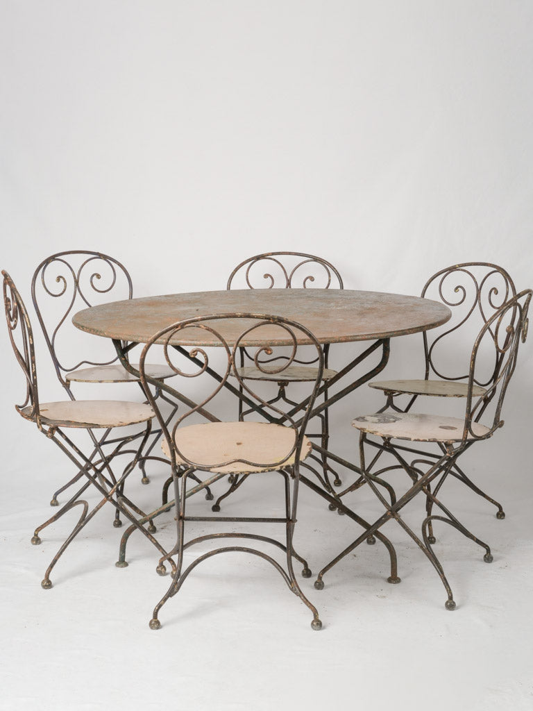 Antique French outdoor setting - round table w/ folding chairs