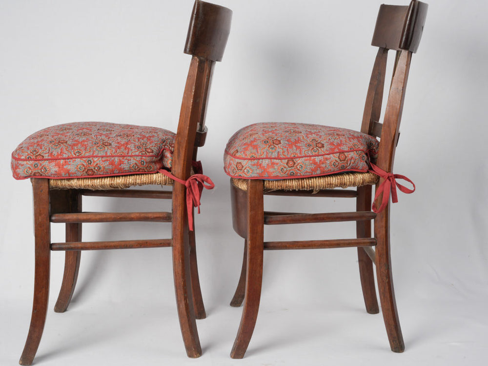 Pair of 19th-century chairs w/ painted scenes on backs