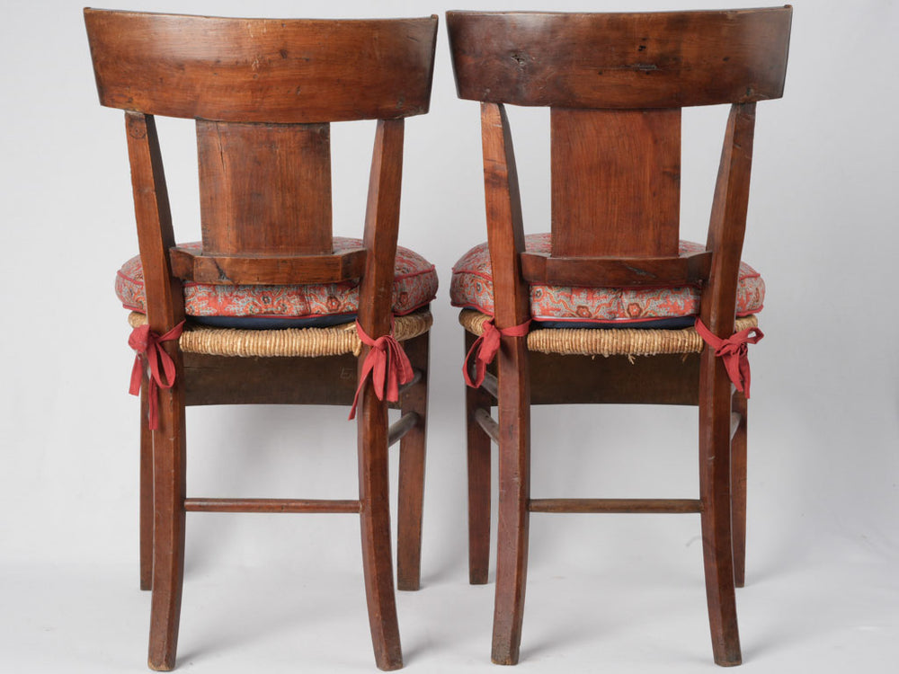 Pair of 19th-century chairs w/ painted scenes on backs