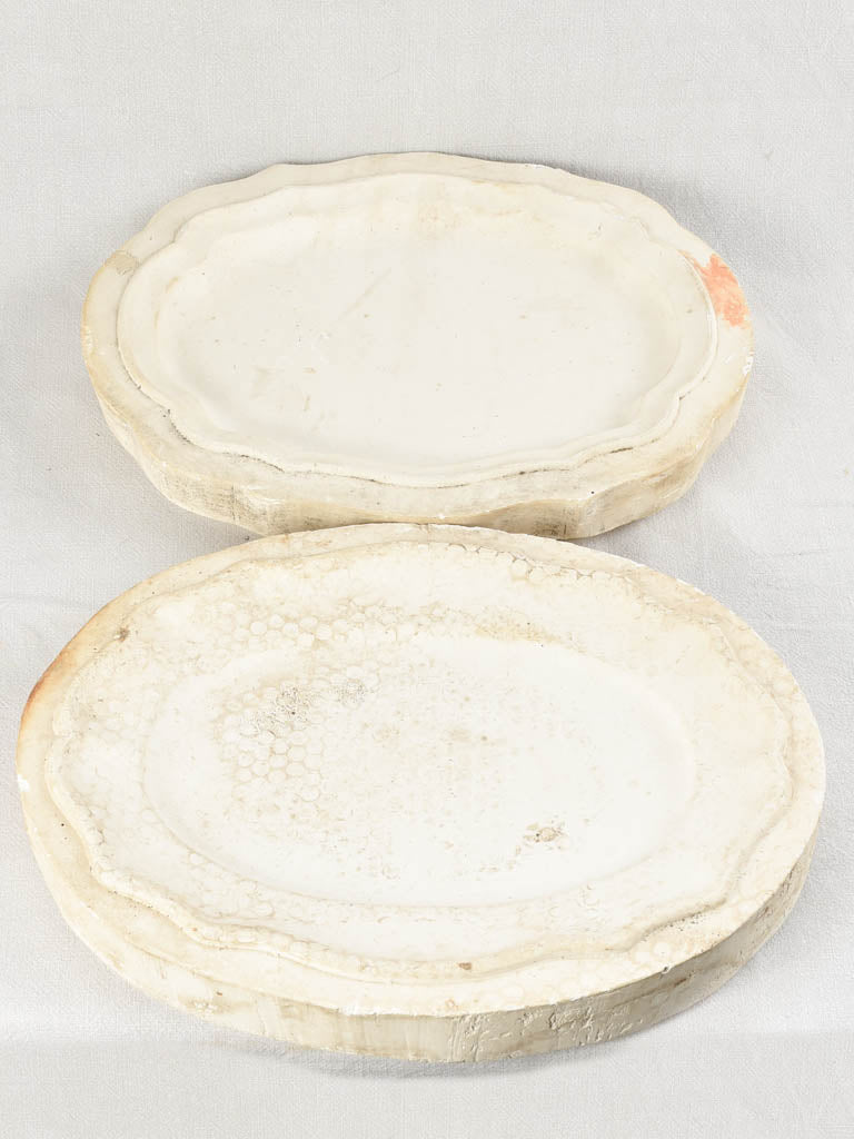 TWO PLASTER MOLDS FOR PLATES 20"