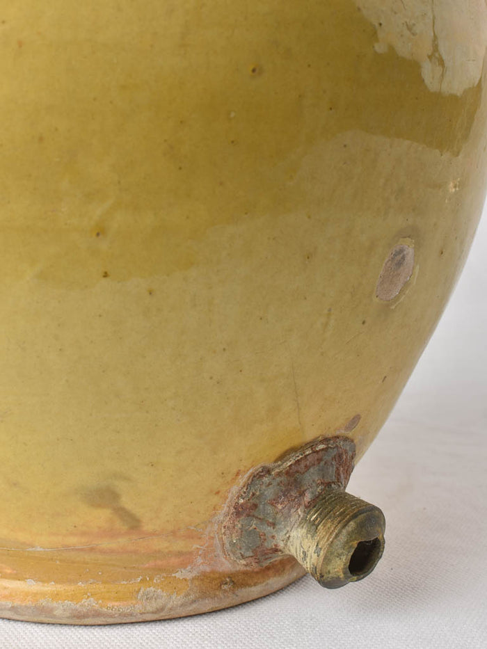 Yellow glazed drinking water kitchen 'fountain' with circular handles