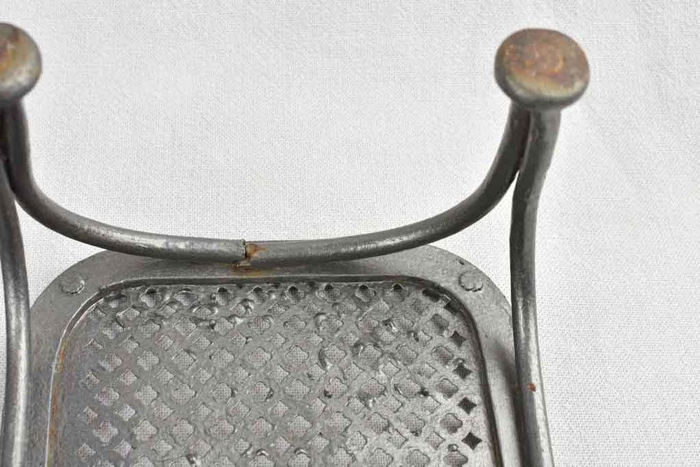 Pair of antique wrought iron garden footrests 12½"