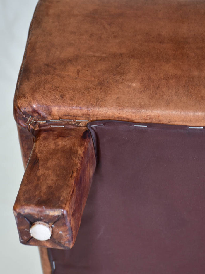 Artisan made leather foot rest for club chairs