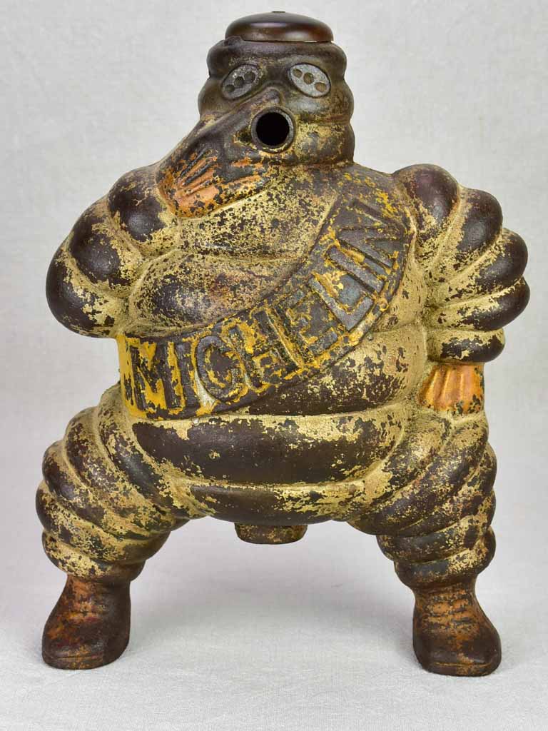 Early 20th century Michelin man, Bibendum from a large air compressor ...